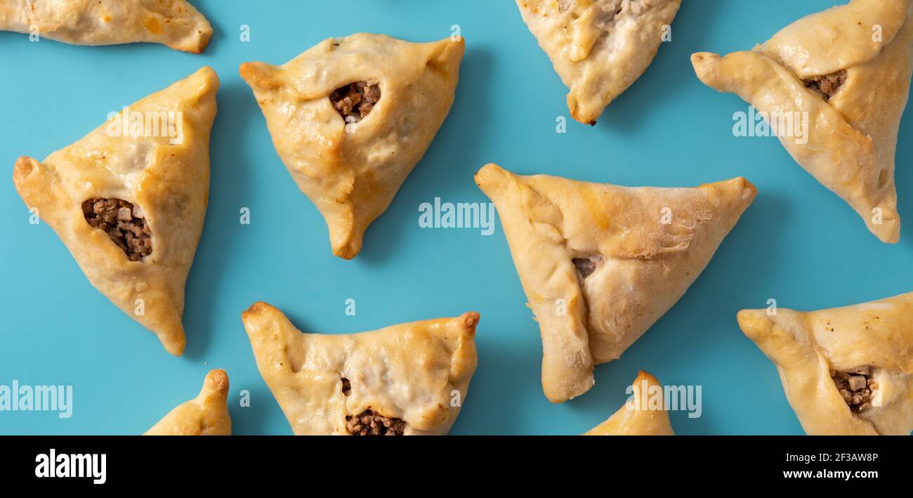Traditional middle eastern fatayer on blue background Stock Photo - Alamy