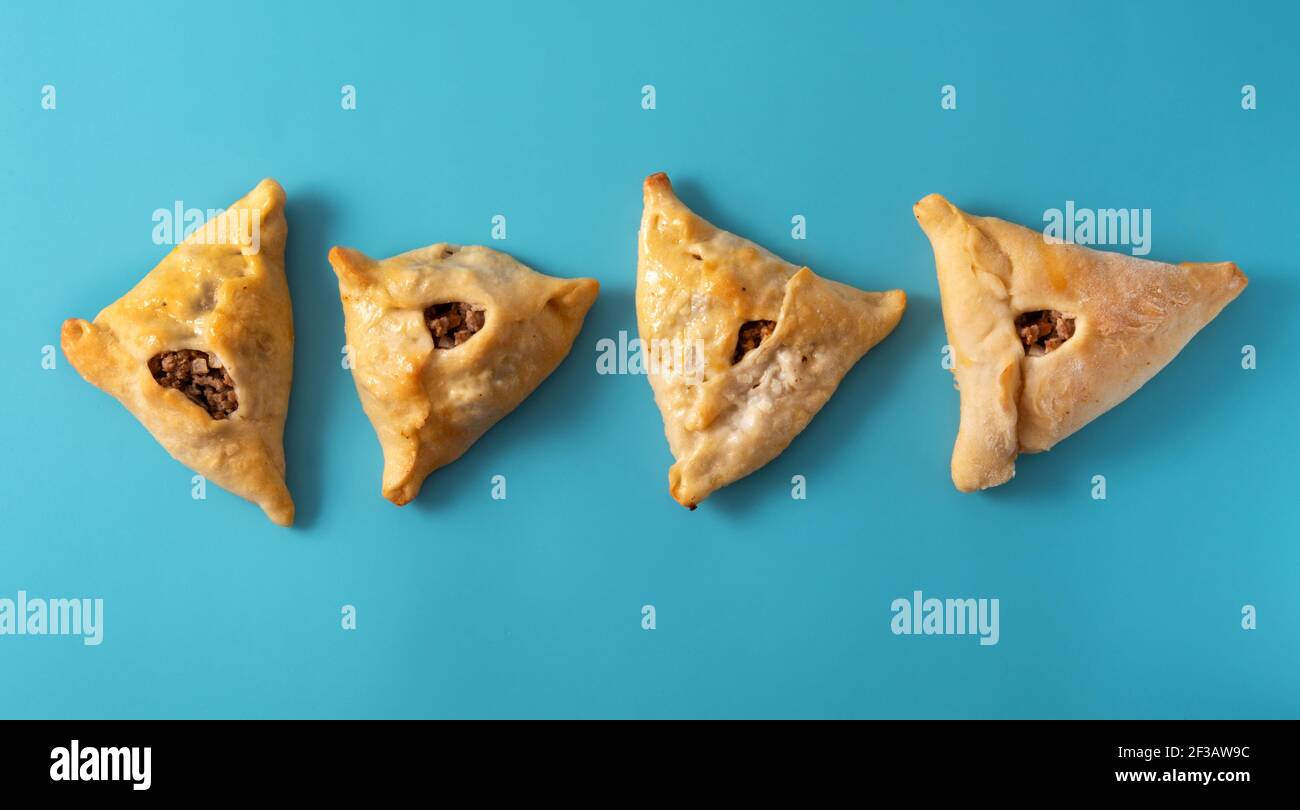 Traditional middle eastern fatayer on blue background Stock Photo - Alamy
