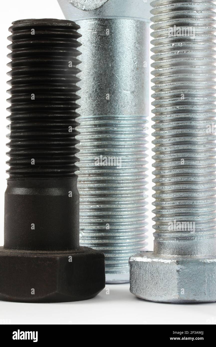 Newly manufactured large screws. Industry background Stock Photo - Alamy