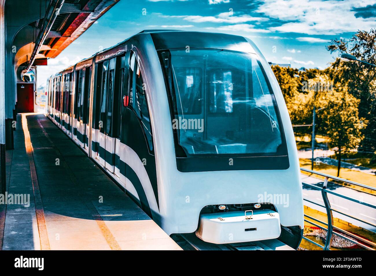 Monorail fast train on railway, close-up Stock Photo - Alamy