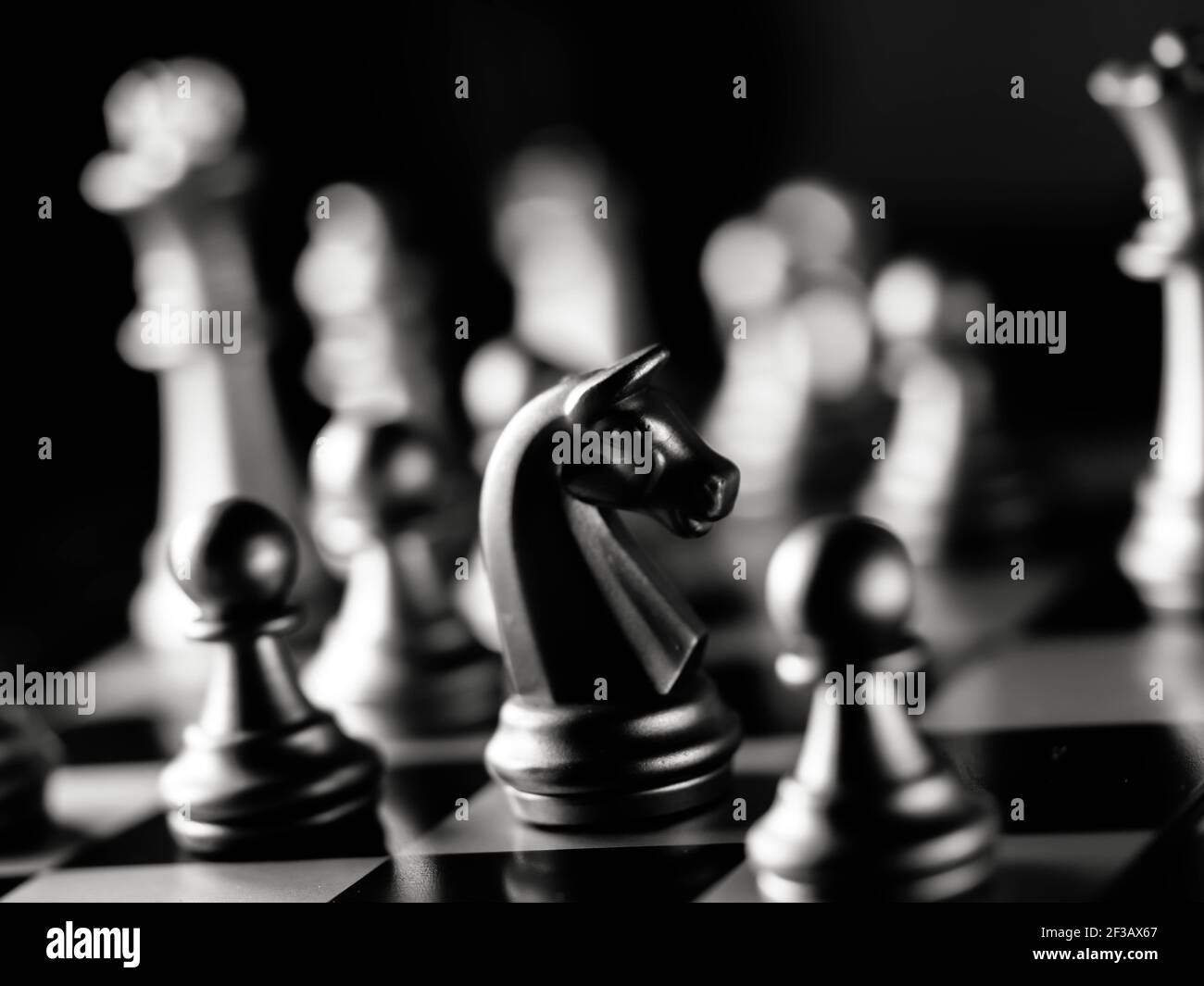 business game competitive strategy with chess board game with blur ...