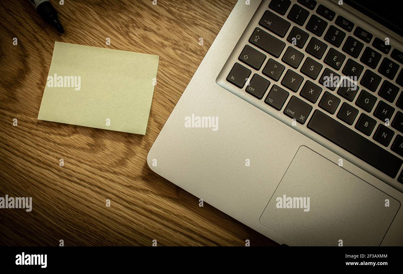 blank note in home office with man hand, pencil and computer Stock ...