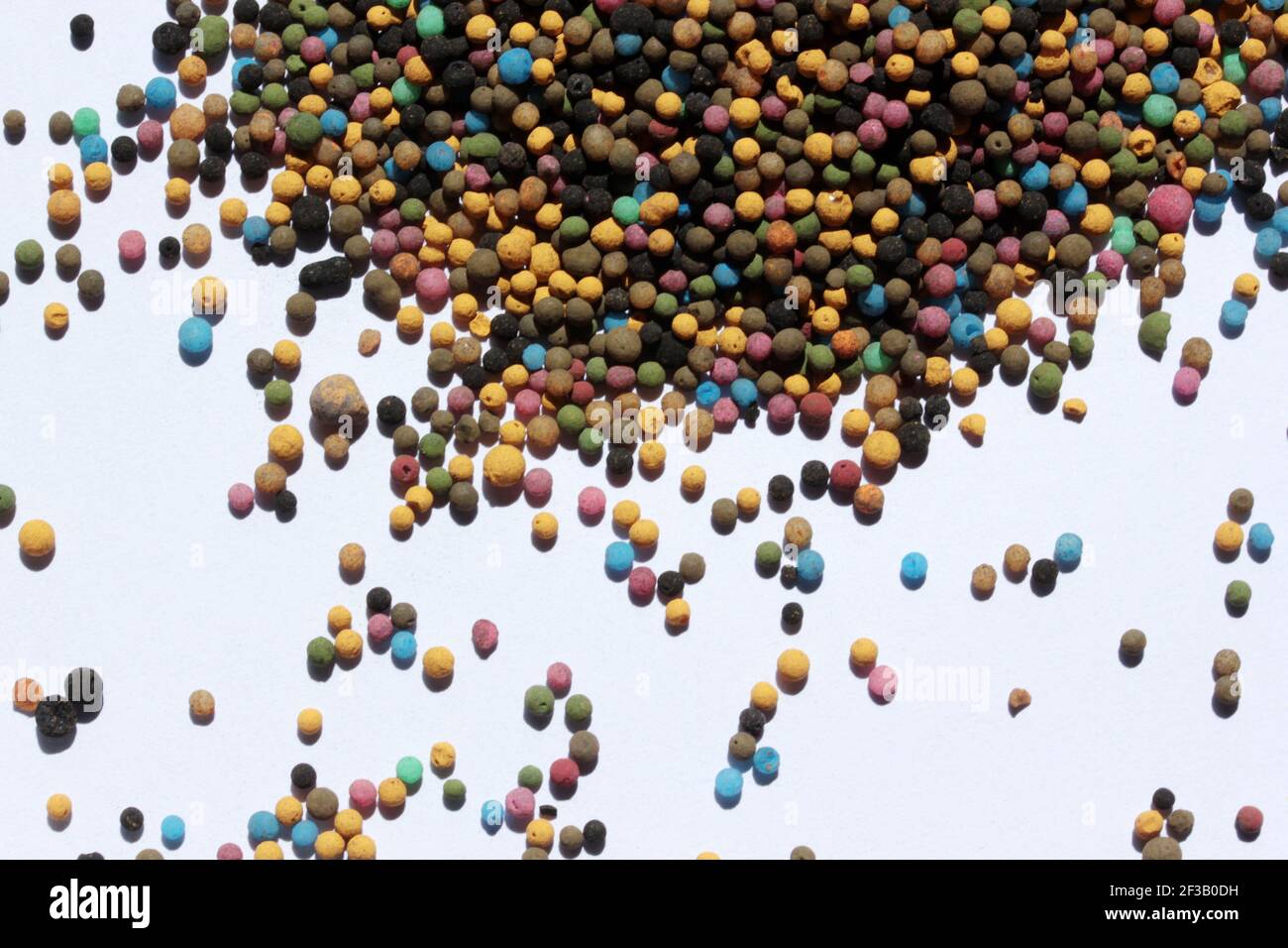powder food colors on a white background Stock Photo - Alamy