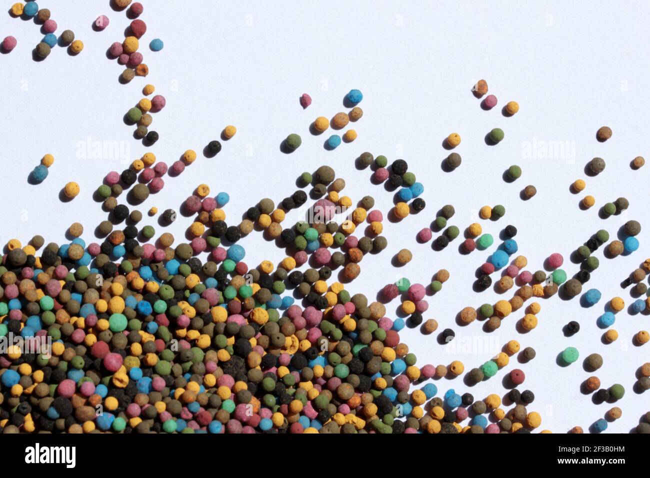 powder food colors on a white background Stock Photo - Alamy