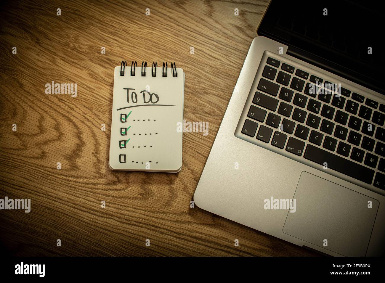 to do list handwriten on wood table in home office Stock Photo - Alamy