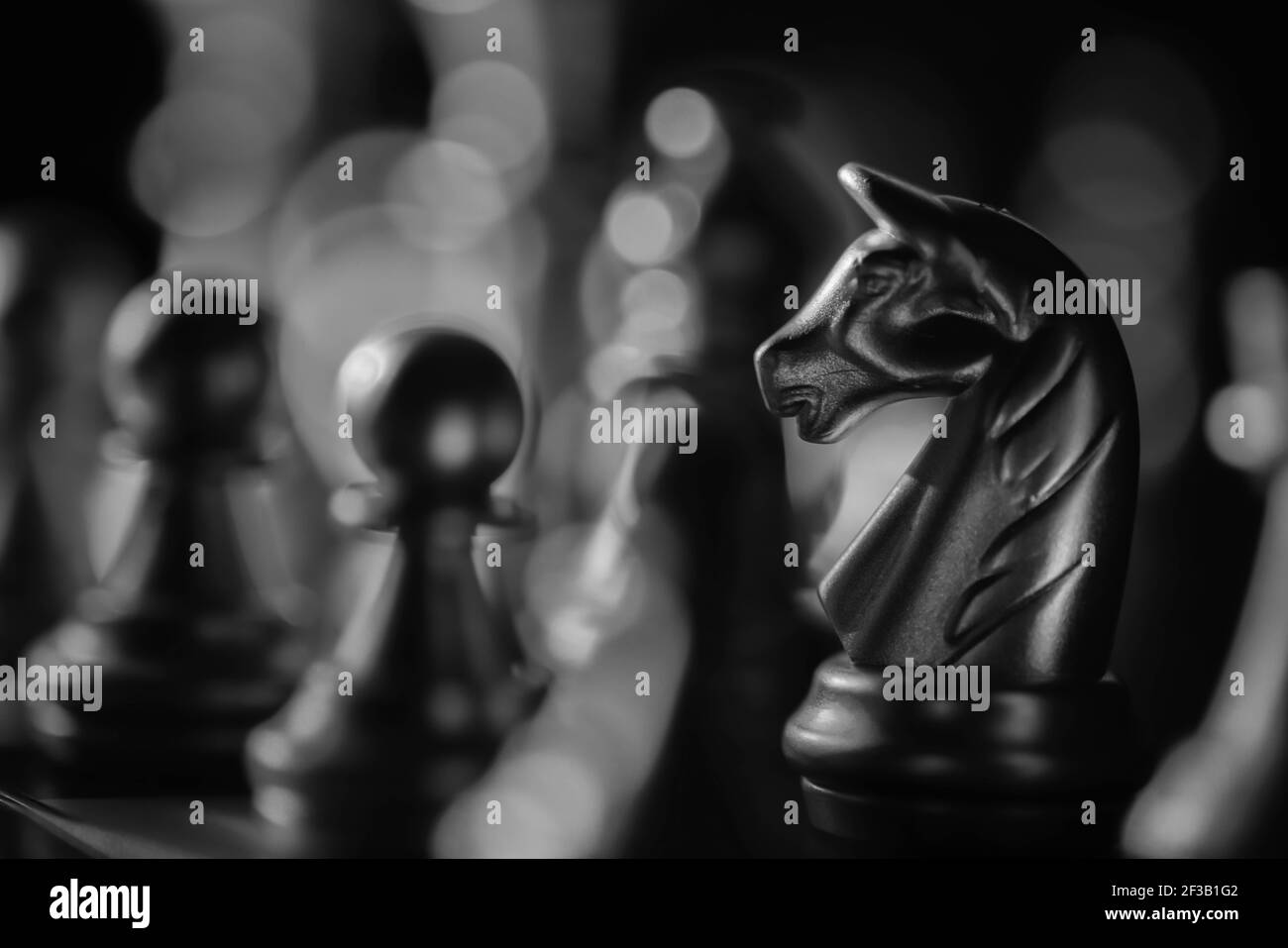 business game competitive strategy with chess board game with blur ...