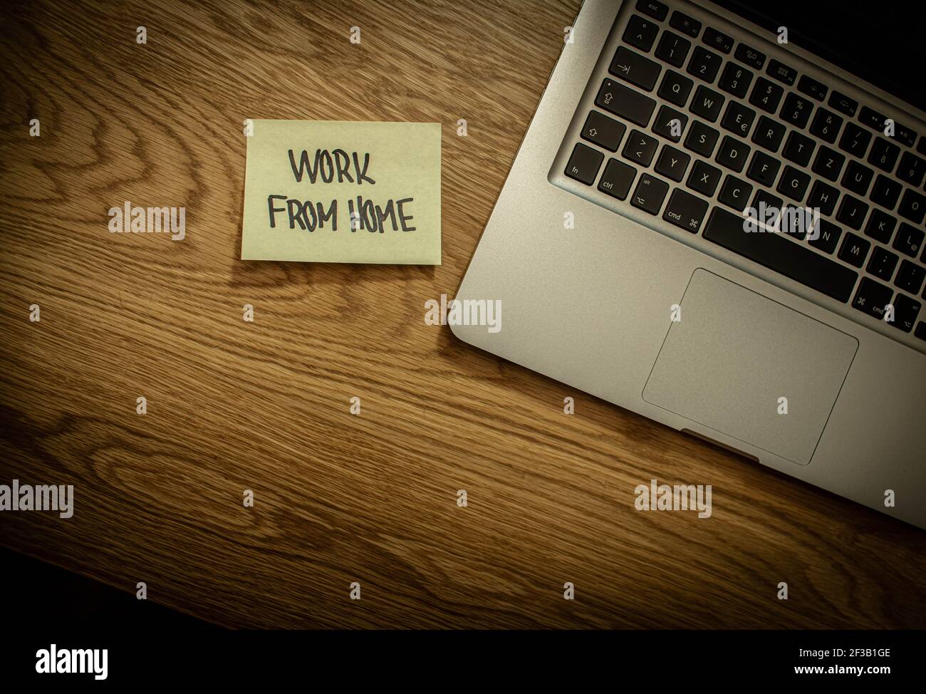 home office work note on wood table with laptop Stock Photo - Alamy