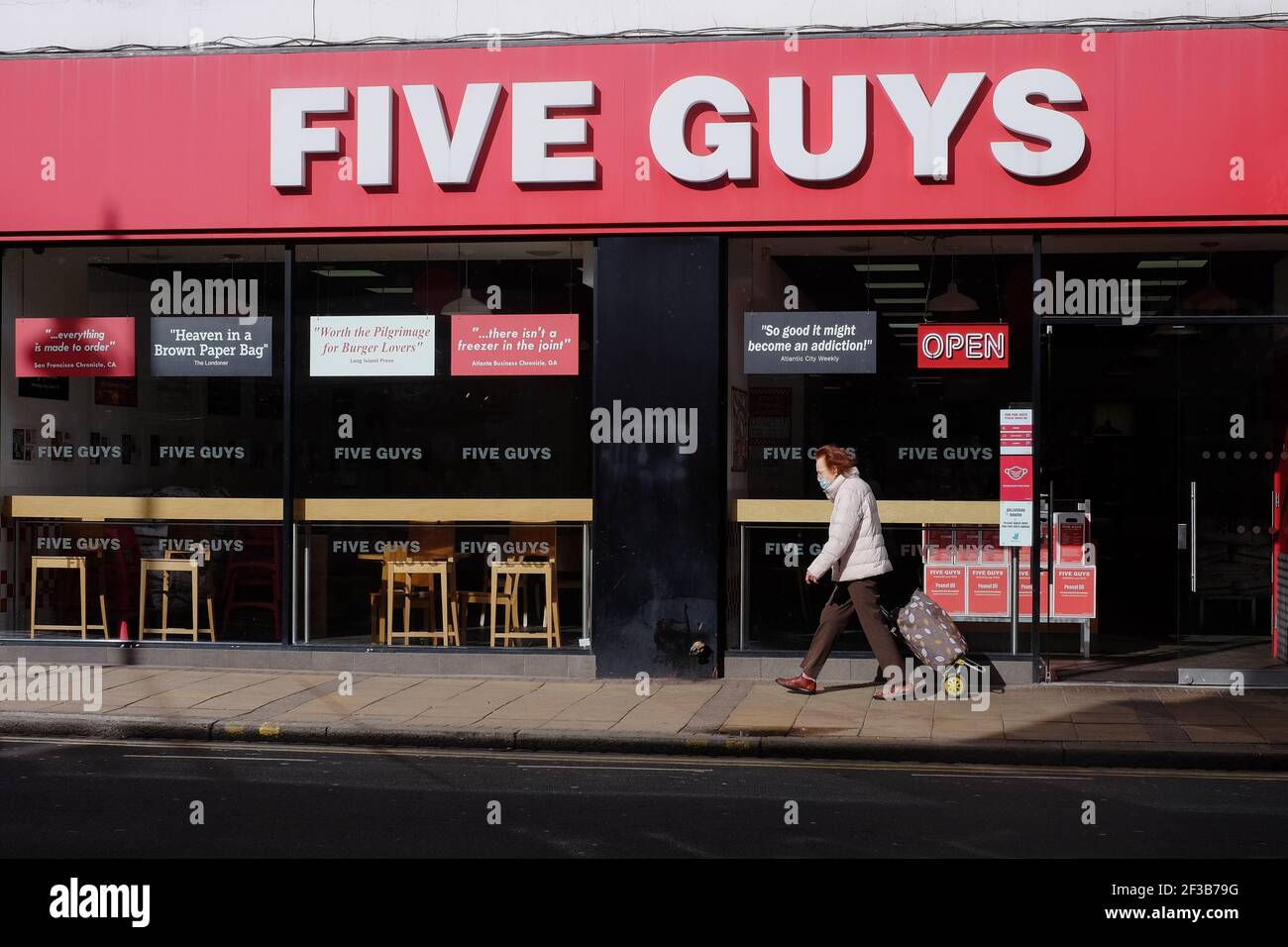 A general view of a Five Guys shop on Wimbledon Broadway, South West ...