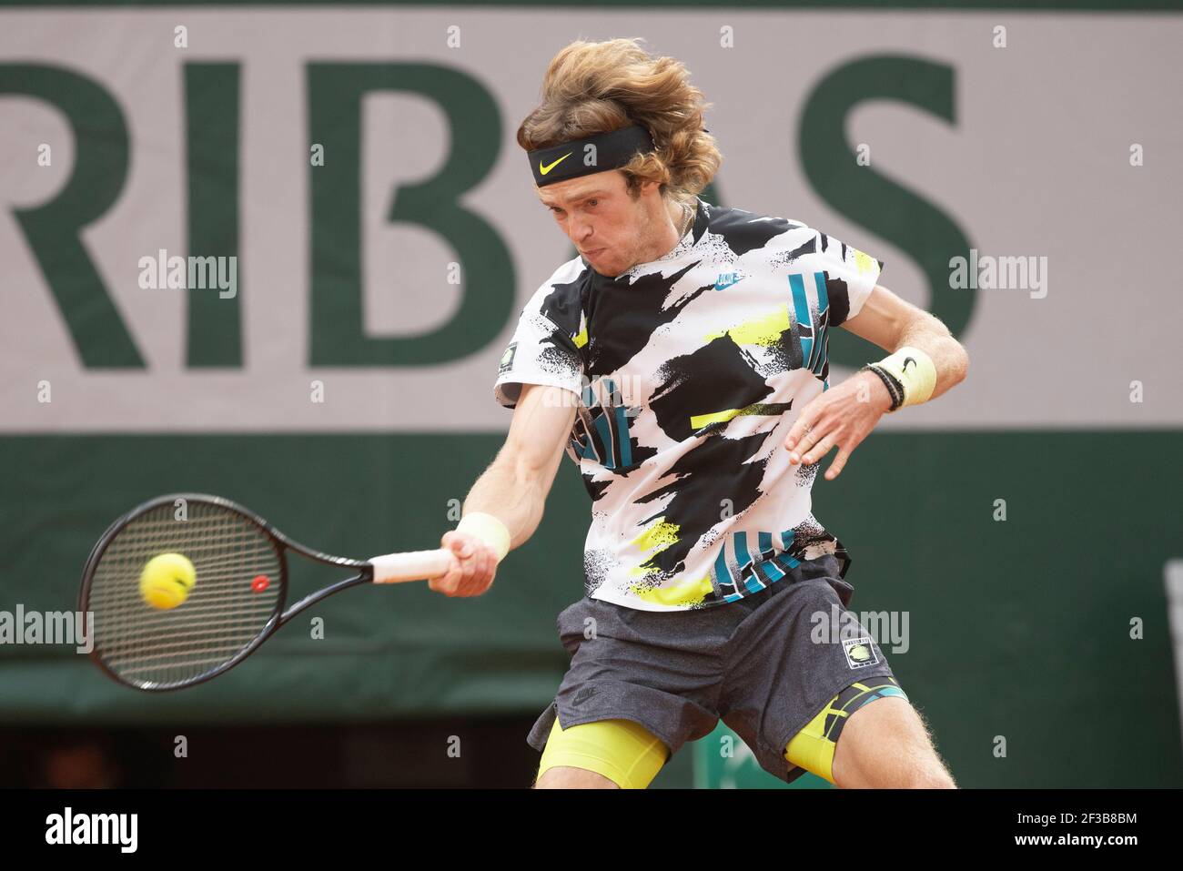 Russian tennis player Andrey Rublev playing a forehand shot during ...