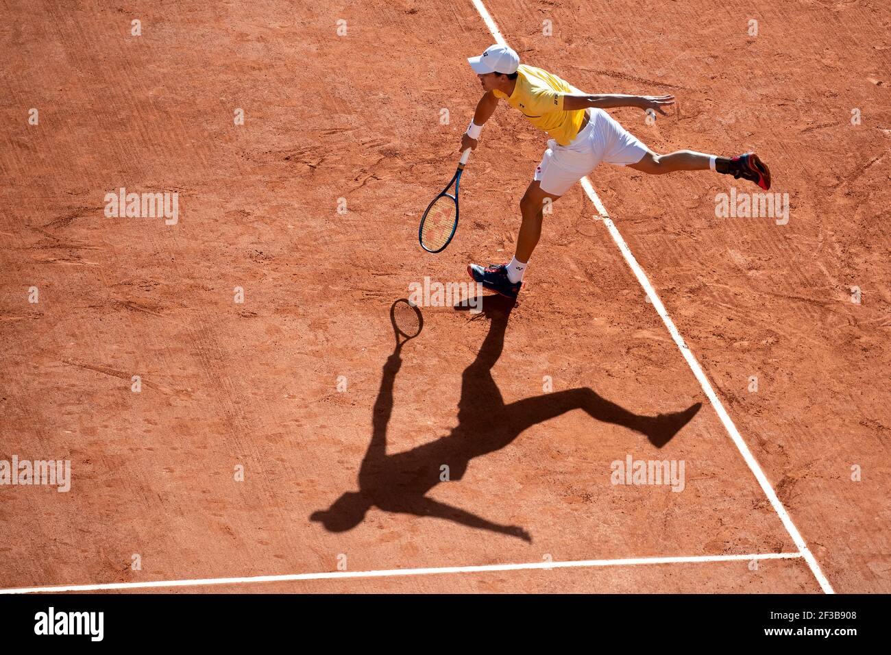 German tennis player Daniel Altmaier playing a service shot during ...