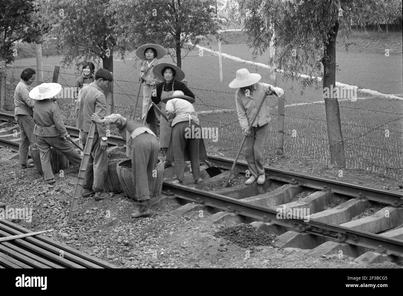 Chinese people construction workers at work, track work, railway line ...