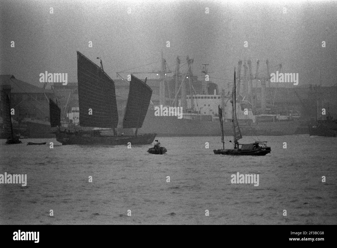 Scene in the port of Shanghai, junk in front of the port backdrop, 02. ...
