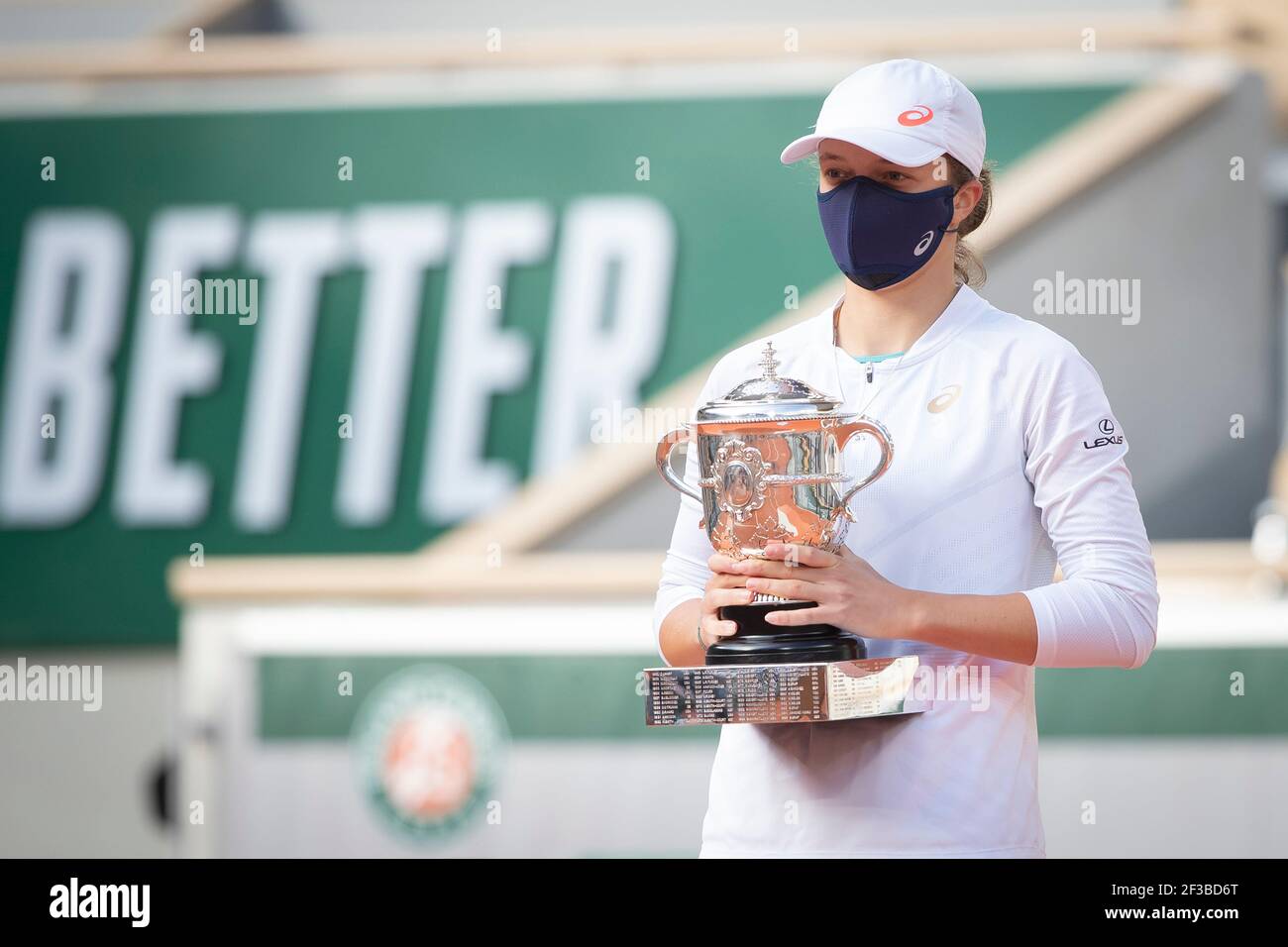 Polish tennis player Iga Swiatek holding championship trophy after ...