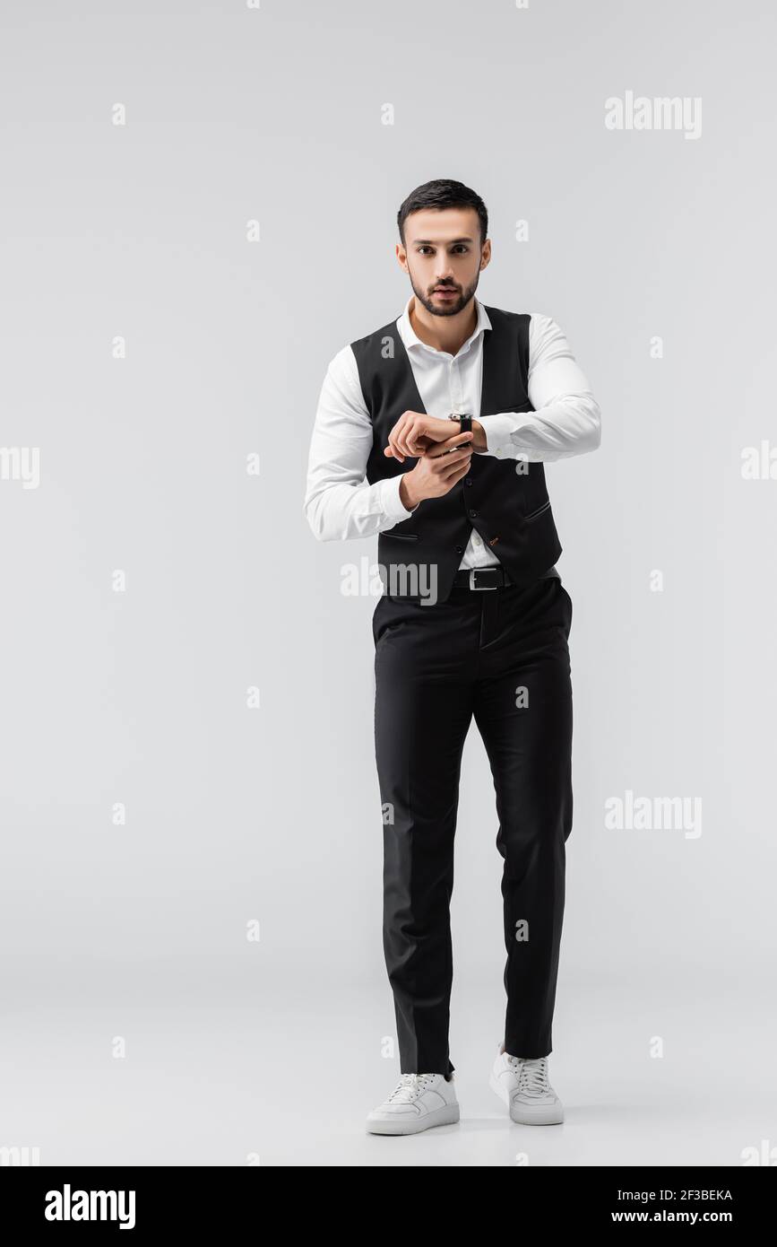 Clothing fix adjust hi-res stock photography and images - Alamy