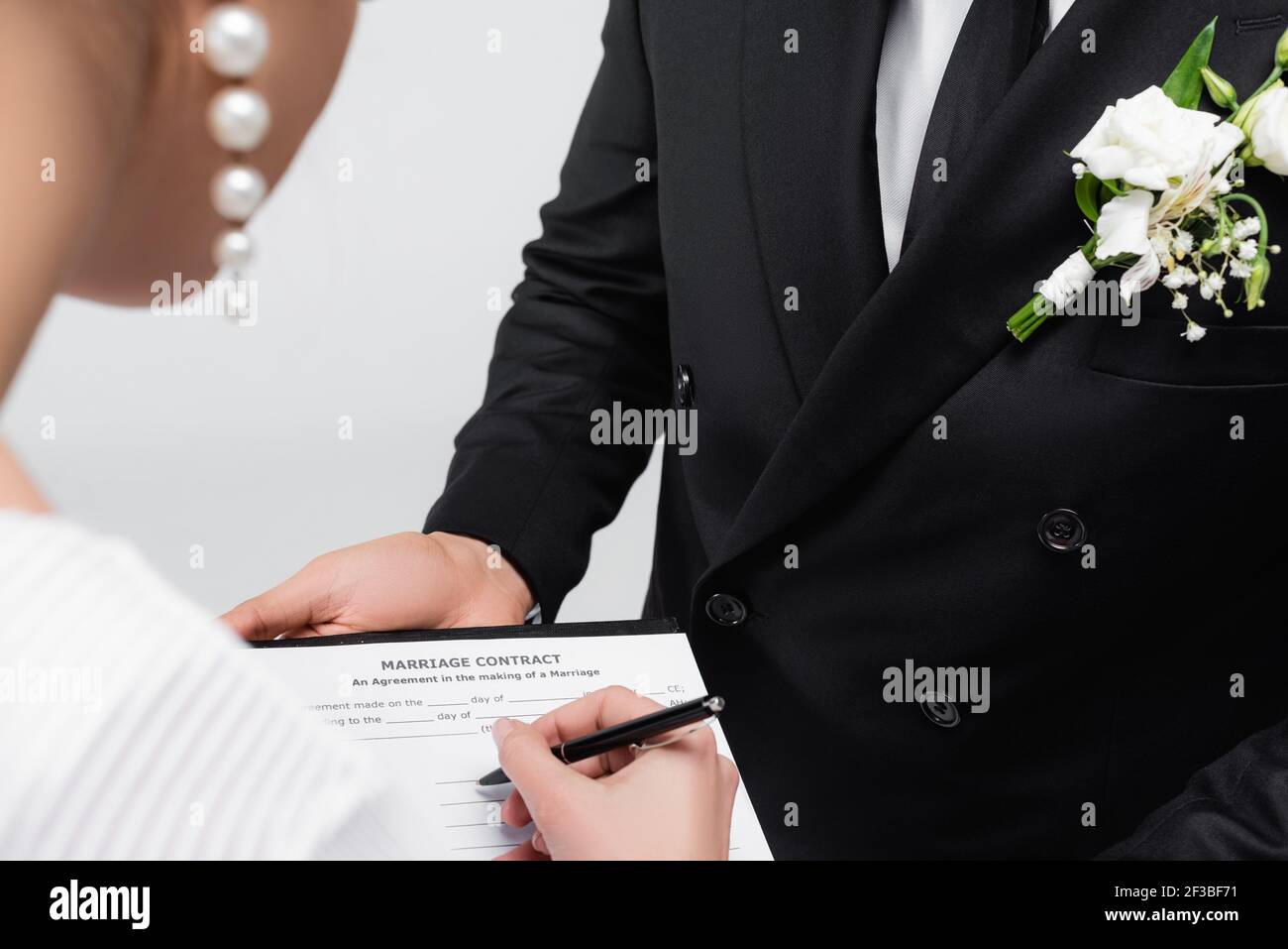 Muslim couple sign contract hi-res stock photography and images - Alamy