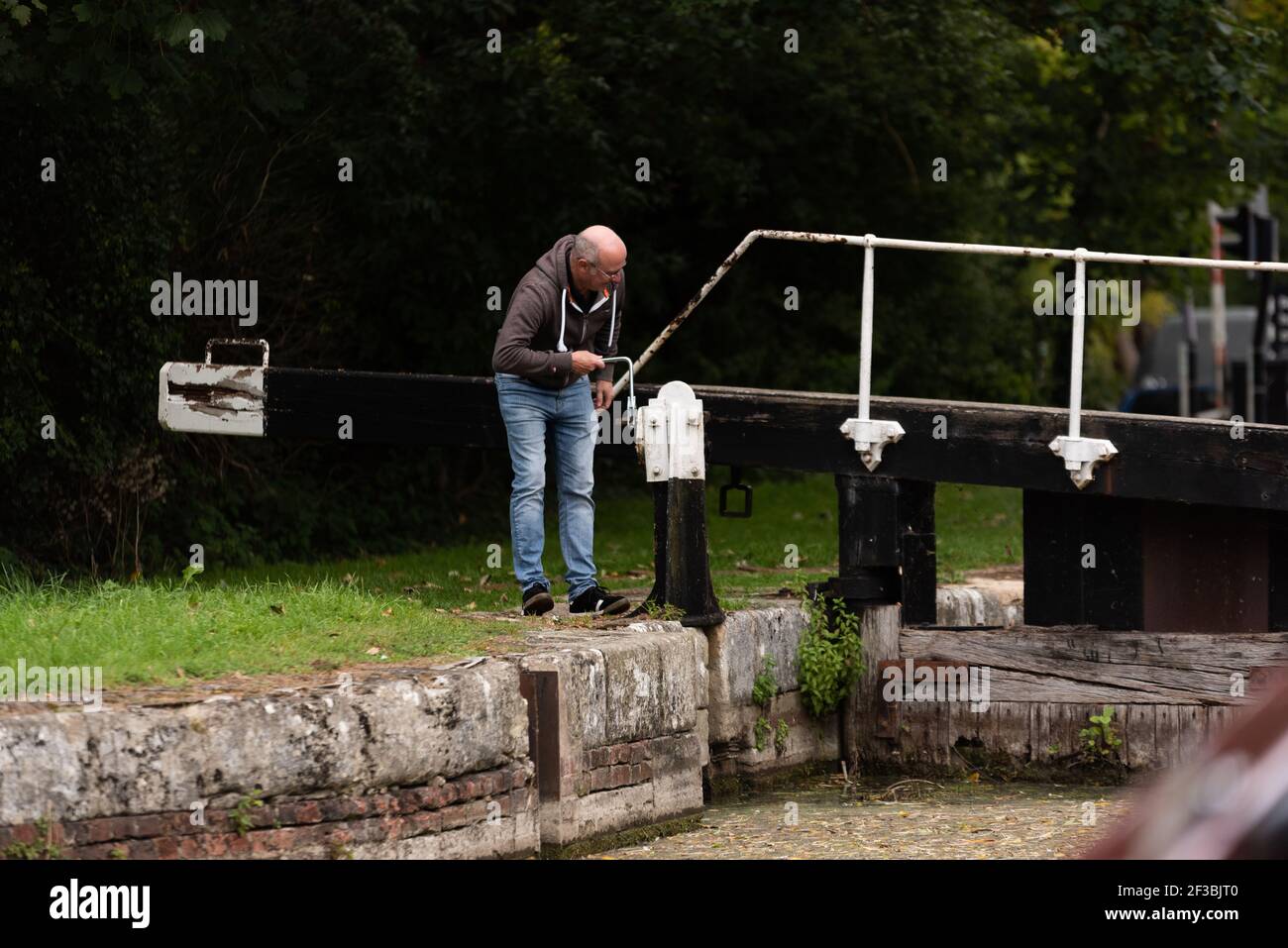 Man opening lock hi-res stock photography and images - Alamy