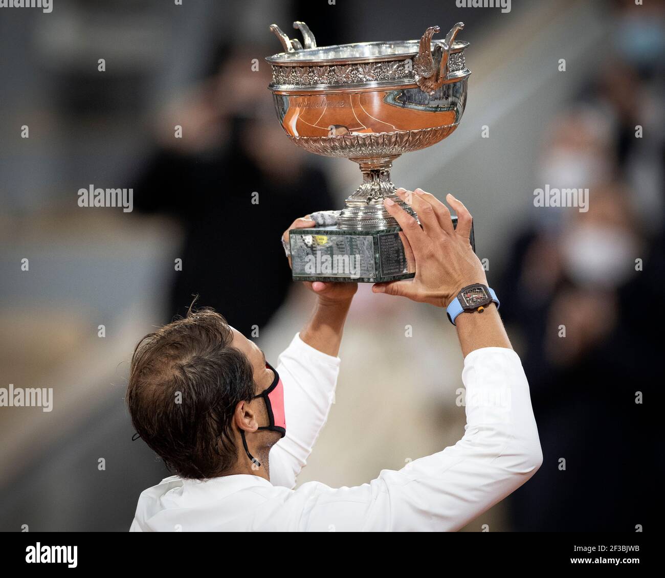 Spanish tennis player Rafael Nadal holding up trophy after winning his ...