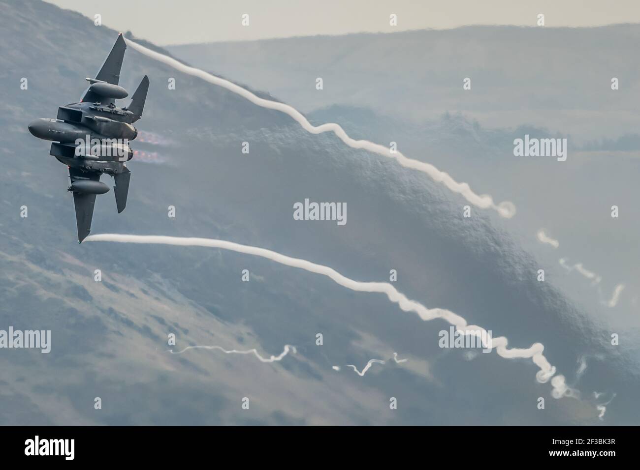 Mach Loop F-15s low level Stock Photo - Alamy