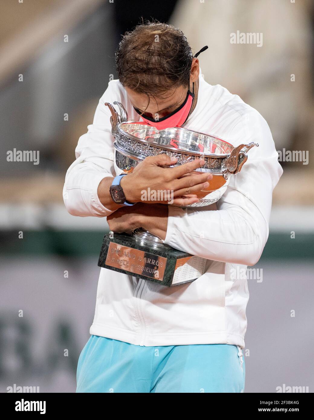 Spanish tennis player Rafael Nadal hugging trophy after winning his ...