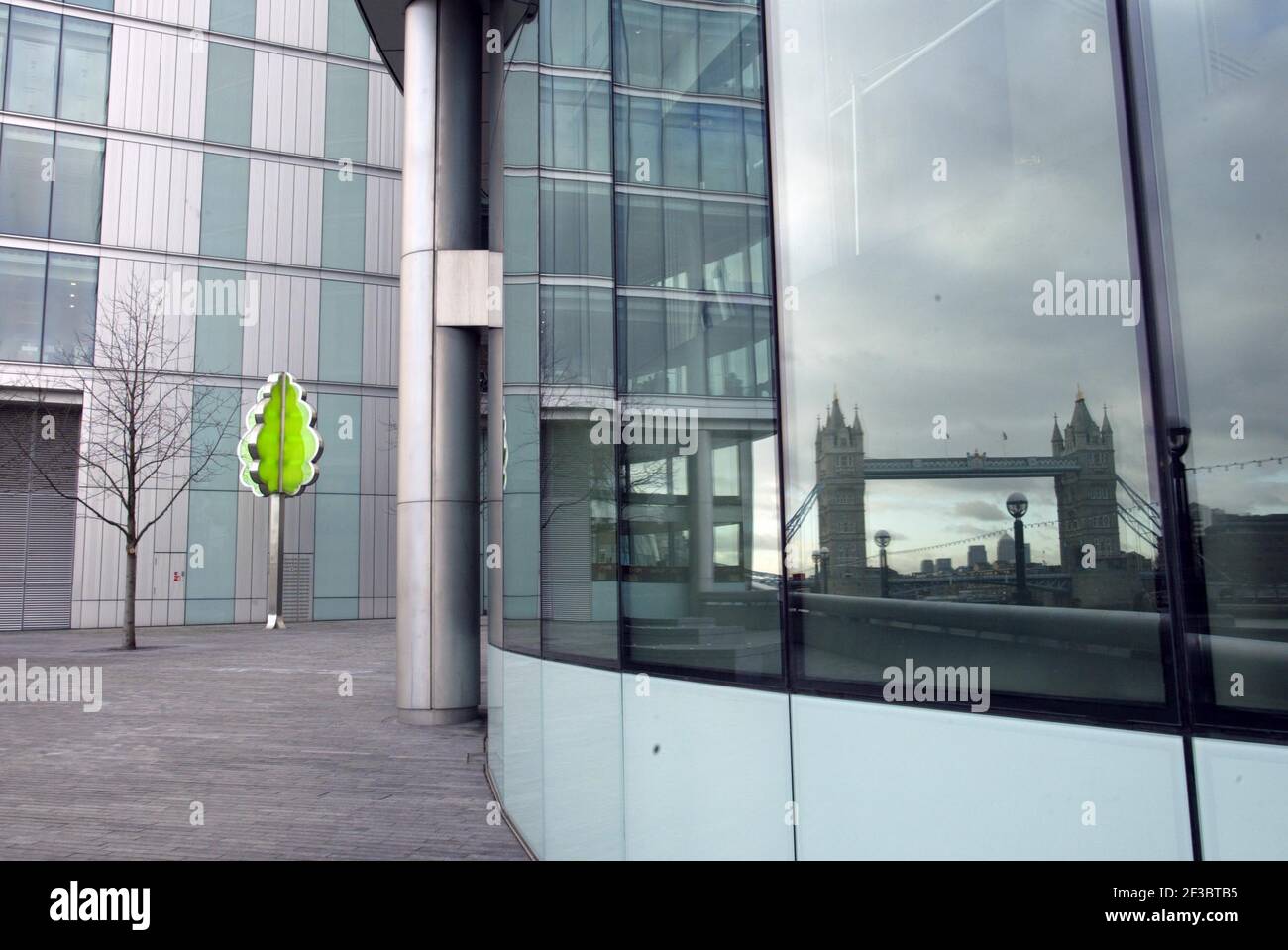 Modern glass buildings in and around the Tower Bridge area, London ...