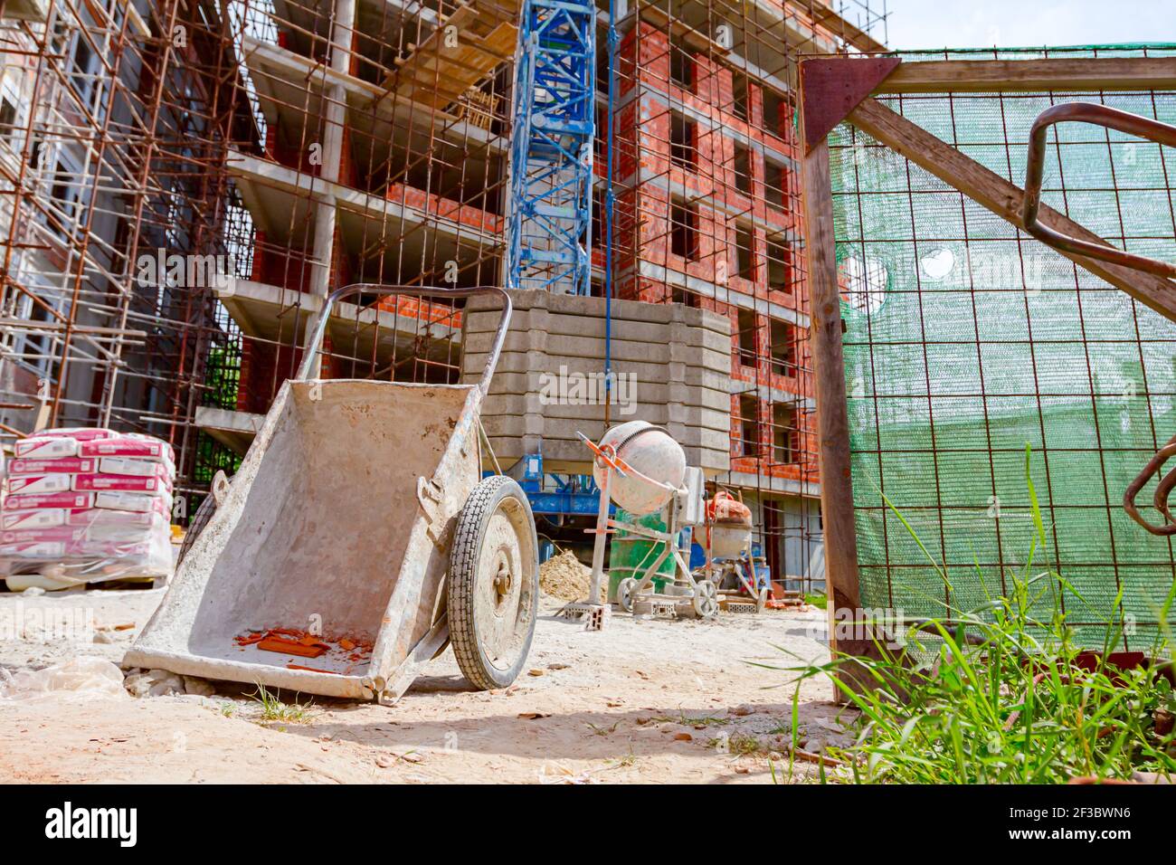 Used industrial barrow placed in front of a concrete ballast, weight ...