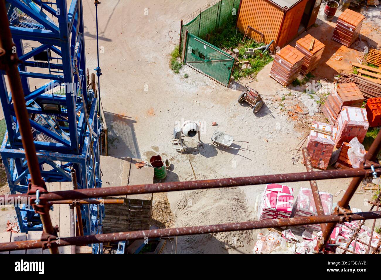 Above view on construction site area, piled resources for building ...
