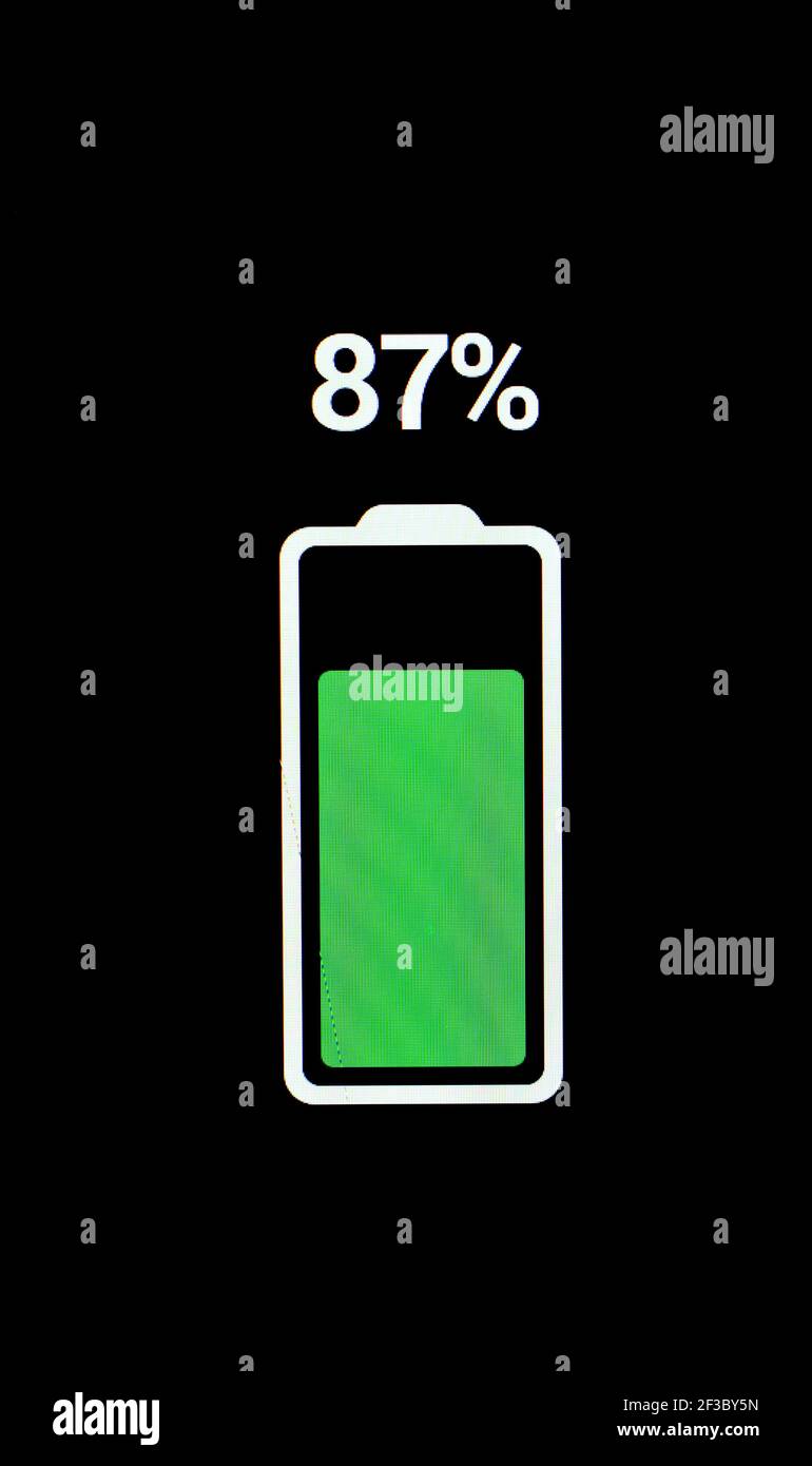 energy concept, battery level indicator on a smartphone display Stock ...