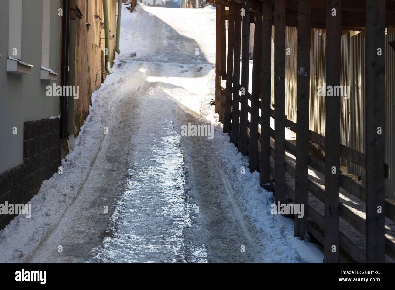 street in the city covered with ice. danger of falling. High quality ...