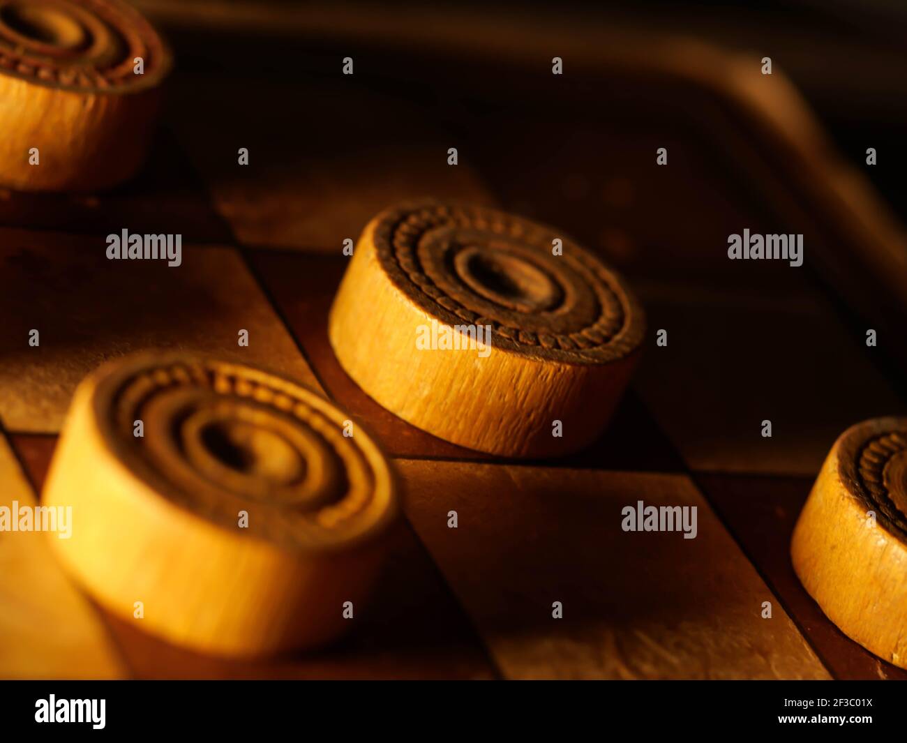 Vintage wooden checkerboard with brown and cream colored checkers Stock ...