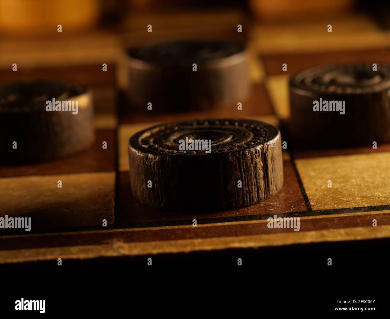 Vintage wooden checkerboard with brown and cream colored checkers Stock ...