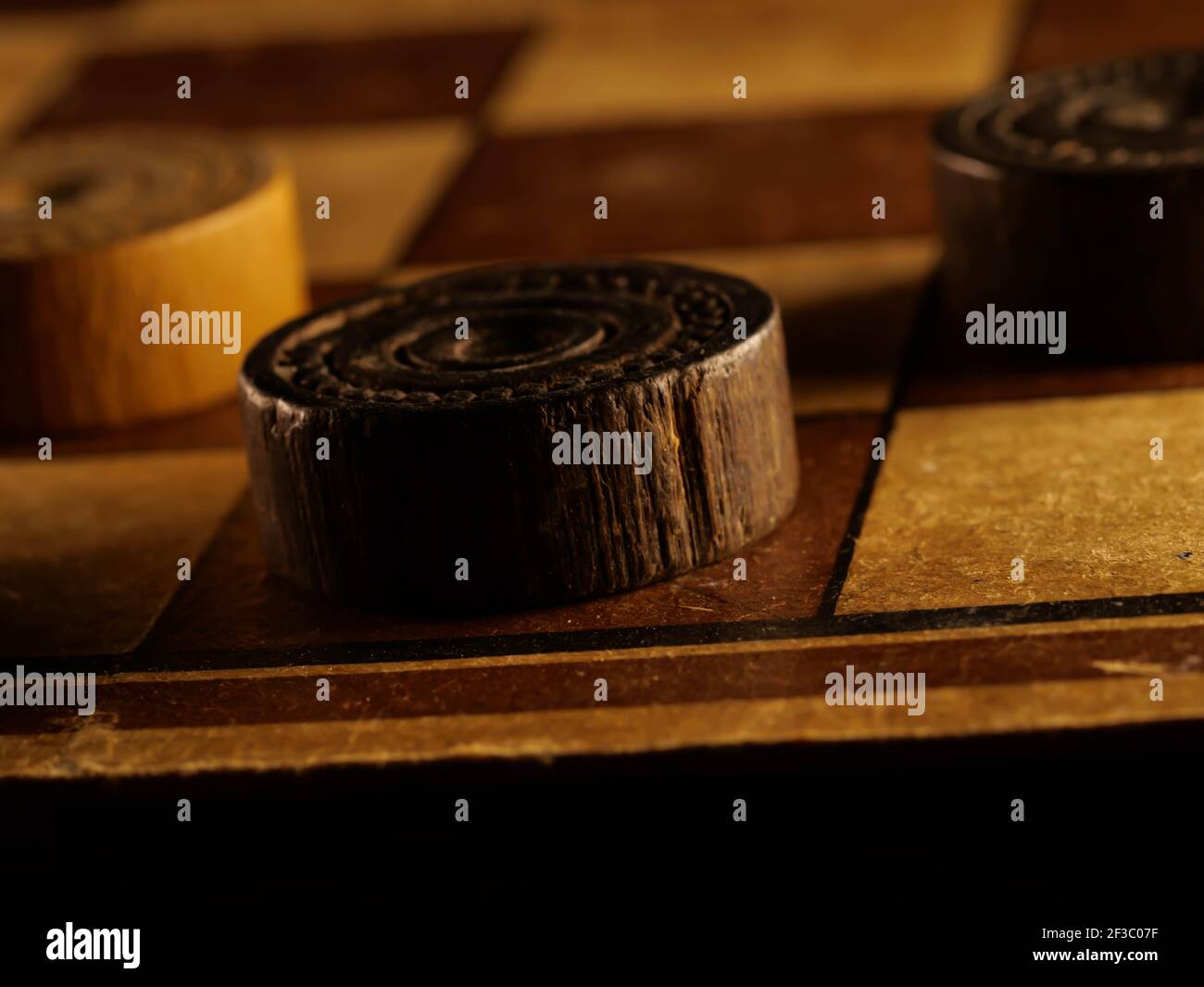 Vintage wooden checkerboard with brown and cream colored checkers Stock ...