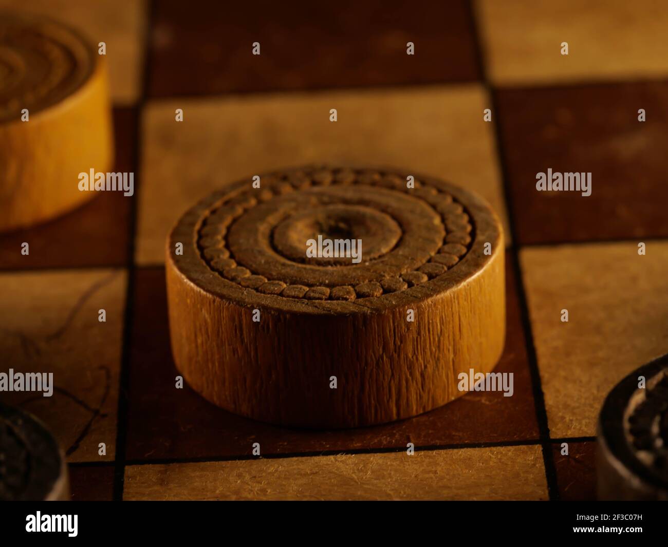 Vintage wooden checkerboard with brown and cream colored checkers Stock ...