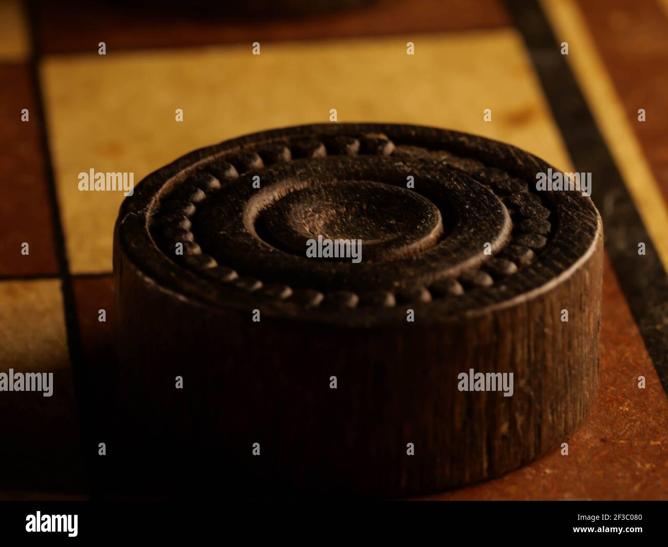 Vintage wooden checkerboard with brown and cream colored checkers Stock ...