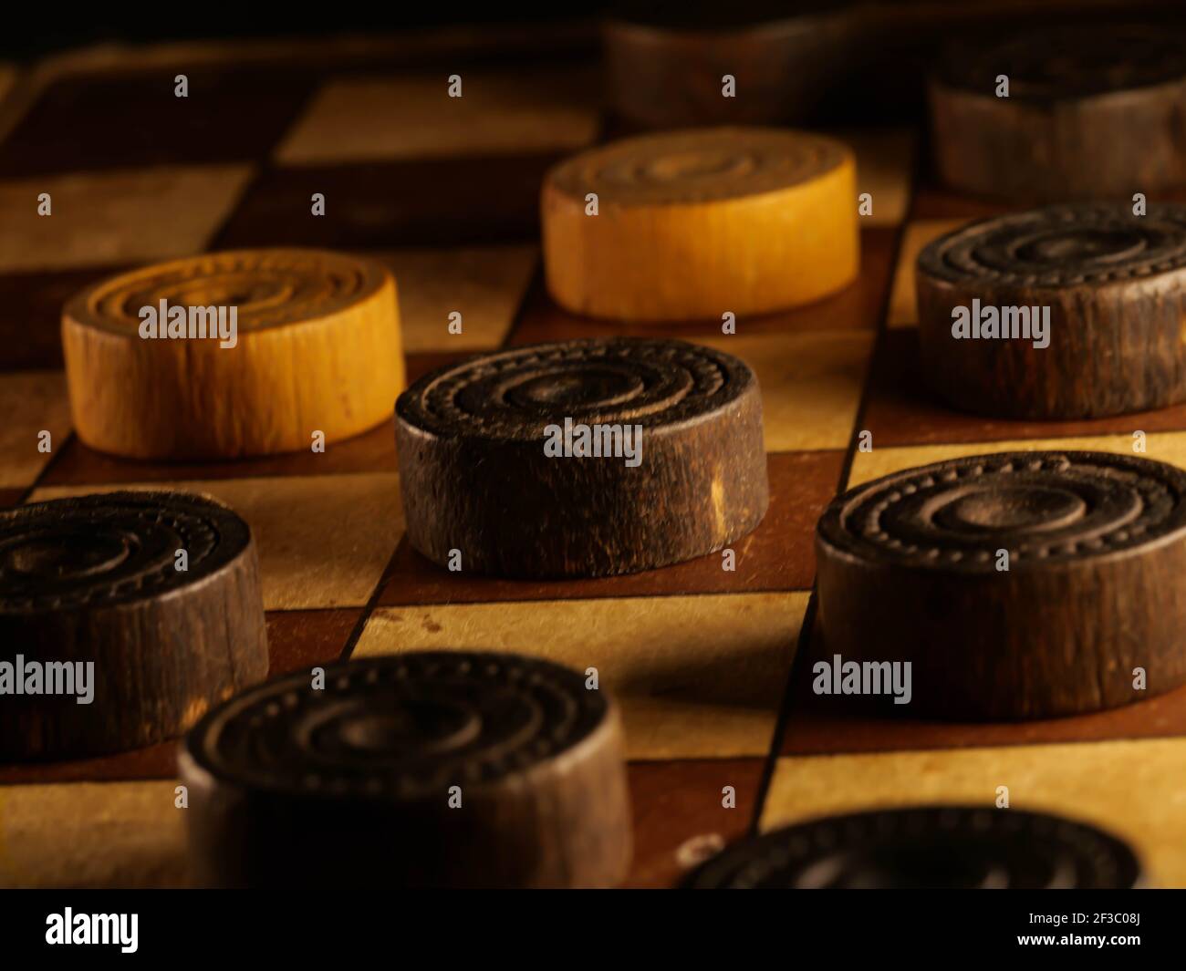 Vintage wooden checkerboard with brown and cream colored checkers Stock ...