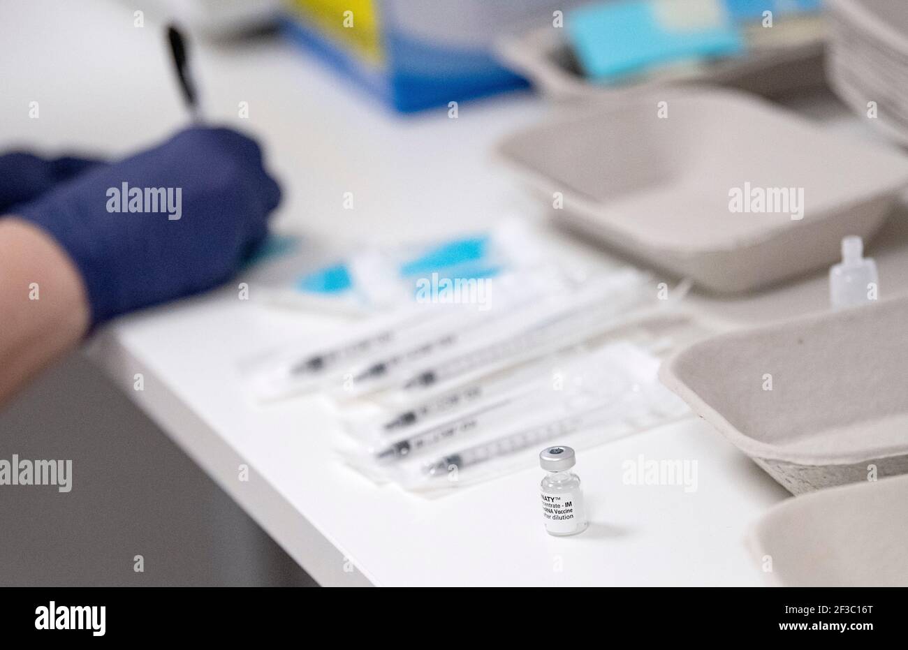 A vial / bottle with Comirnaty Covid-19 vaccine made by Pfizer ...