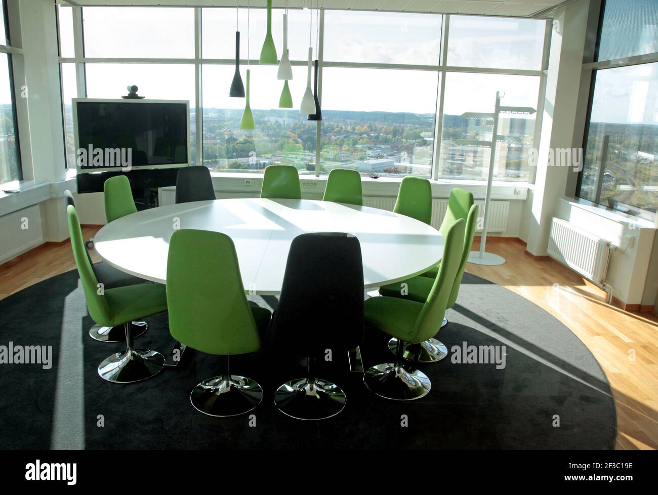 A conference table in a conference room at a company Stock Photo - Alamy