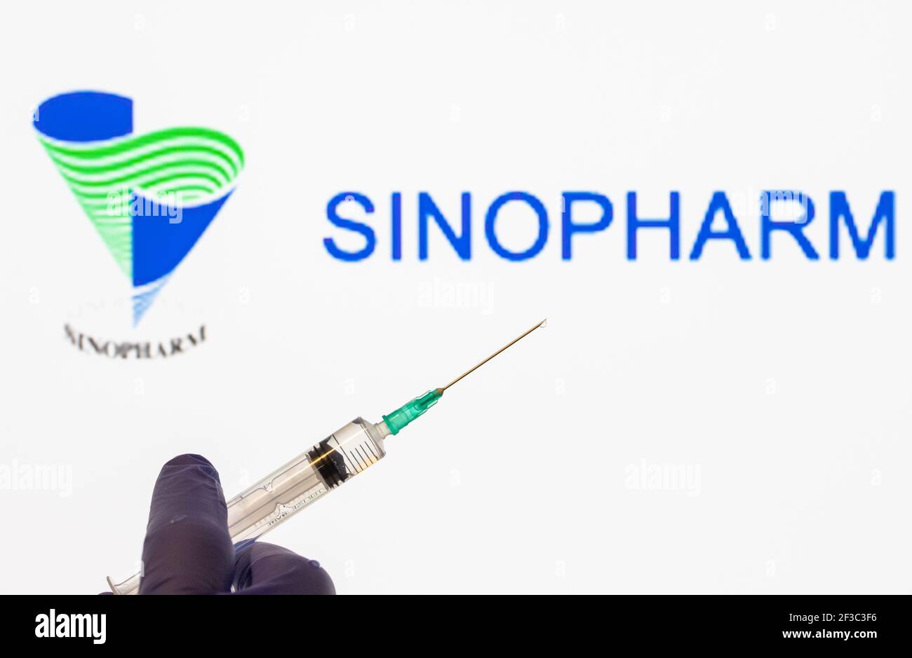 CLUJ-NAPOCA -ROMANIA - MARCH 9 2021: Sinopharm vaccine Covid-19 concept. Syringe needle and ...