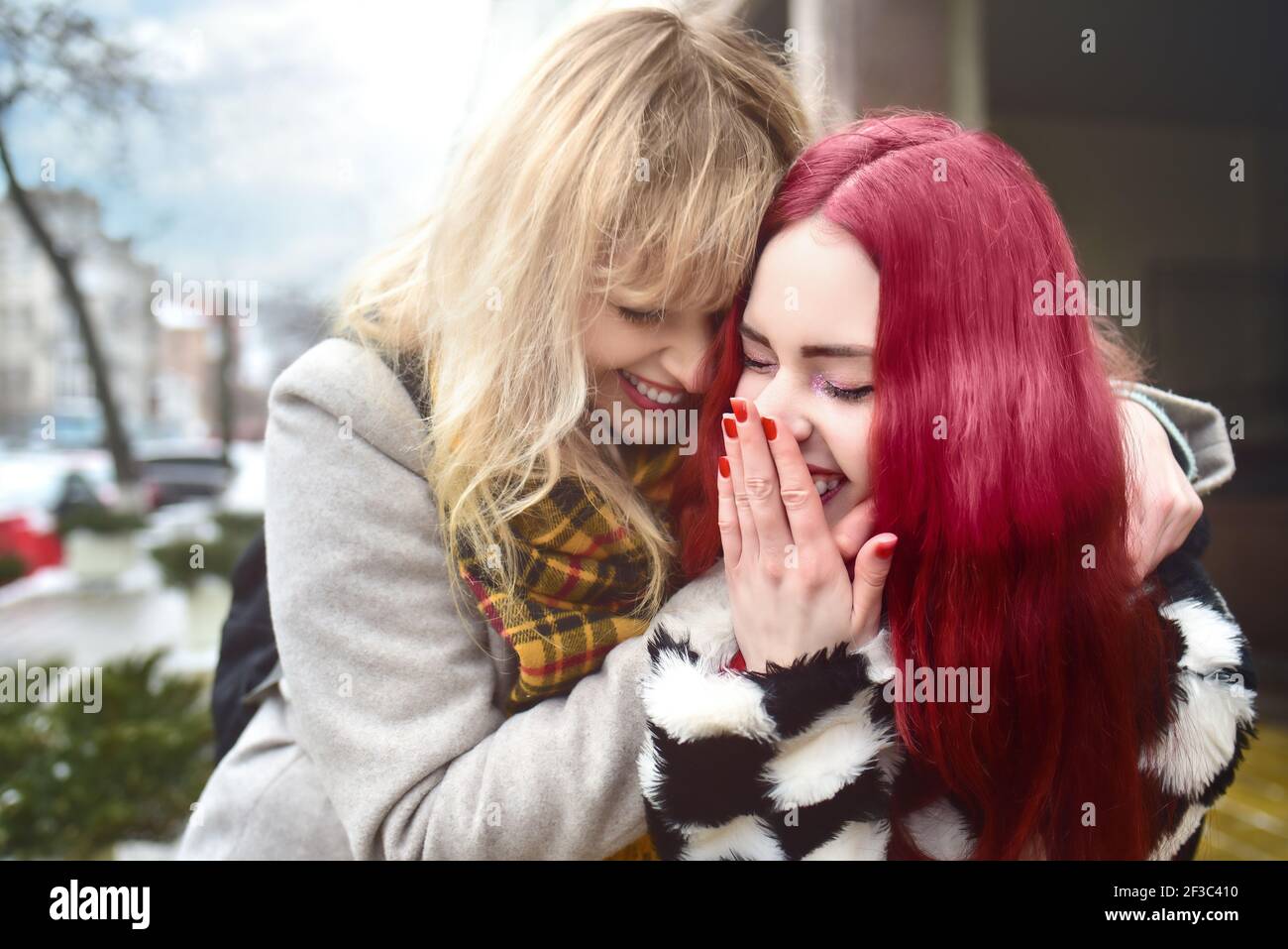 Beautiful Lgbt Couple. Hug of two lesbian Women. Blonde and red Hair ... Beautiful Lgbt Couple. Hug of two lesbian Women. Blonde and red Hair ...