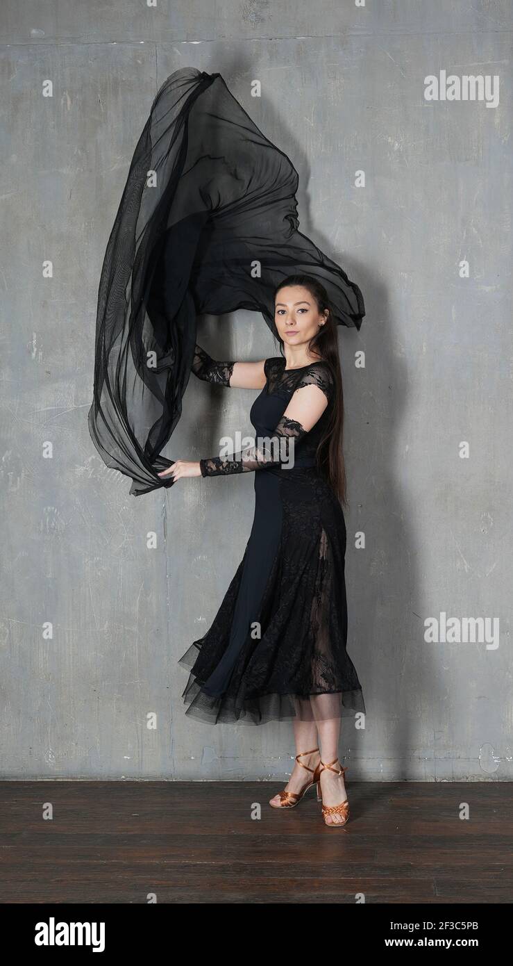Woman dancer in motion with piece of fabric Stock Photo - Alamy