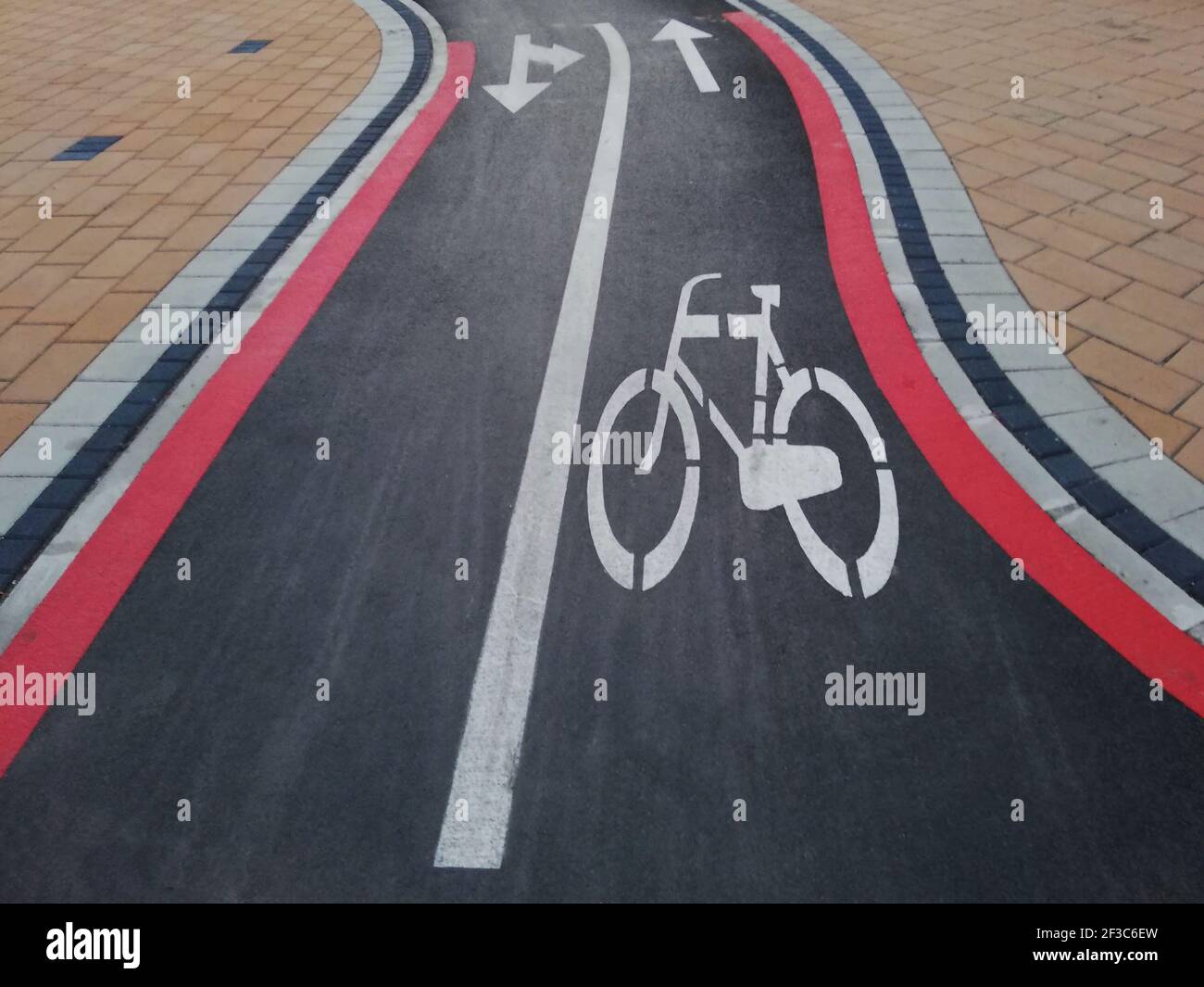 A bicycle street line track and arrow sign for the direction Stock ...