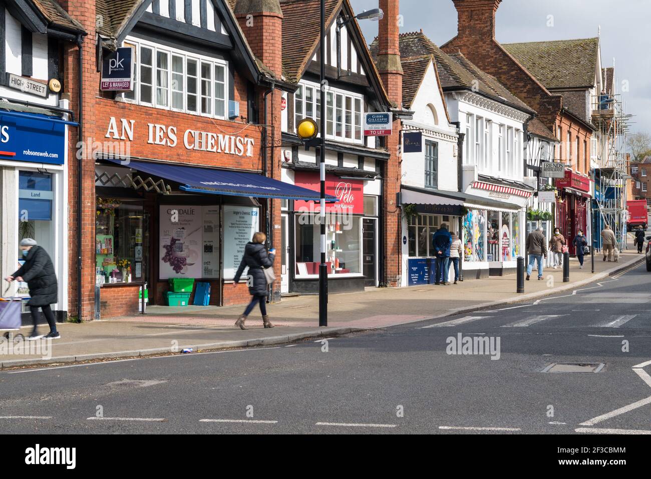 People out and about on an early Spring morning in High Street, Pinner ...