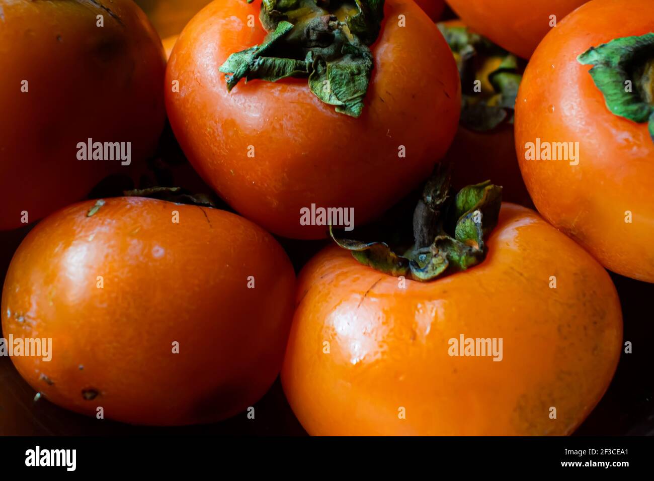 Persimmon photos hi-res stock photography and images - Alamy