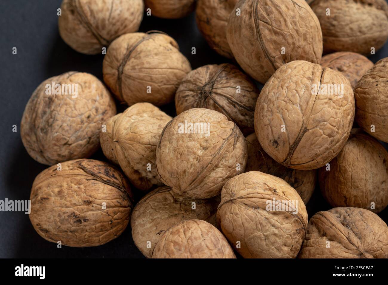 Scattered pile of walnuts hi-res stock photography and images - Alamy