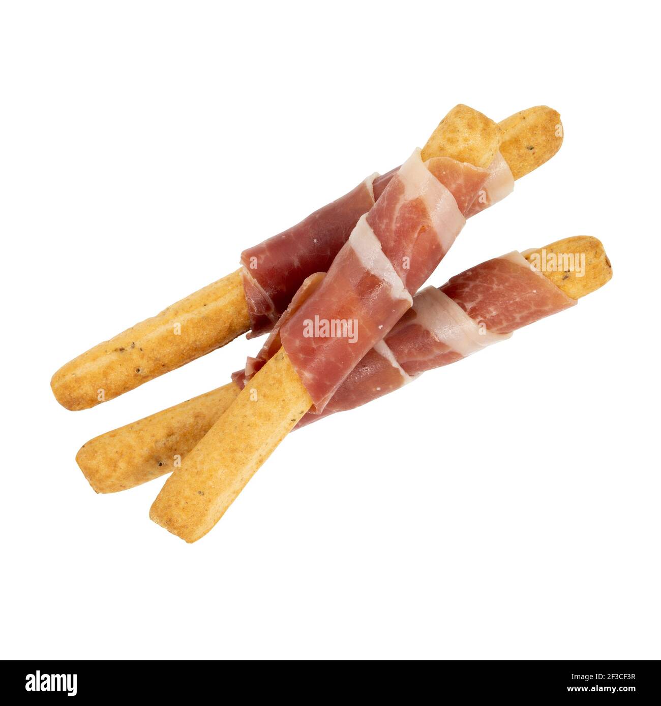 Bread sticks grissini with italian prosciutto crudo or spanish jamon ...