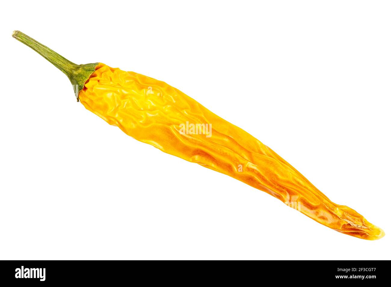 Yellow dried chili pepper isolated on white background Stock Photo - Alamy