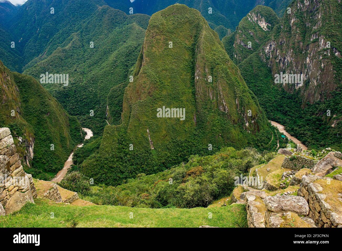 A landscape of hills covered in greenery under the sunlight in Peru ...