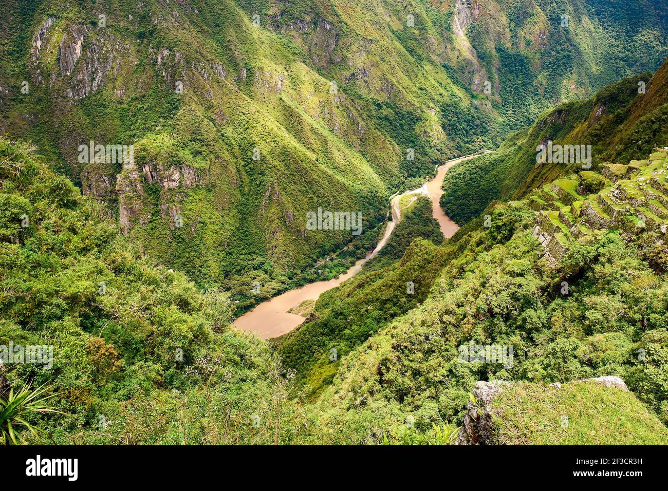 A landscape of hills covered in greenery under the sunlight in Peru ...