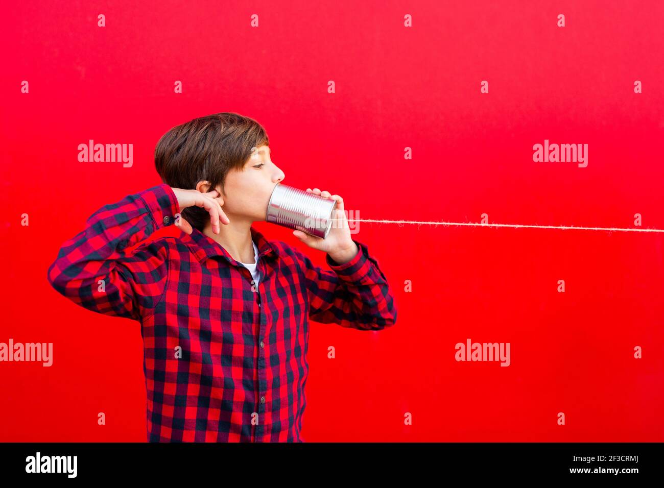 Tin can telephone vintage hi-res stock photography and images - Alamy