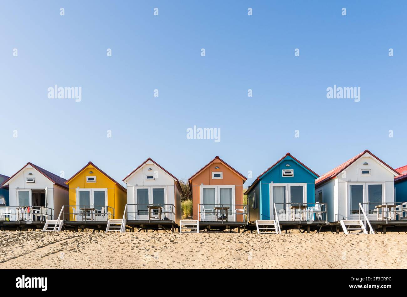 Several colored beach houses in the Netherlands Stock Photo - Alamy
