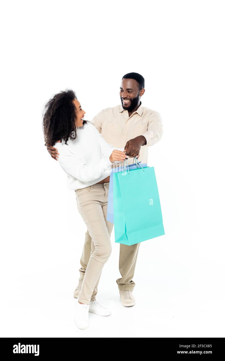 Woman Handing Shopping Bags